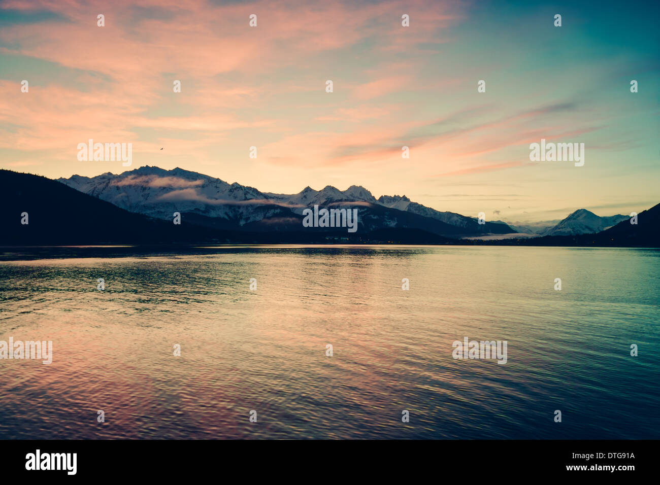 Colorful sunset in Southeast Alaska as seen by ferry Stock Photo - Alamy
