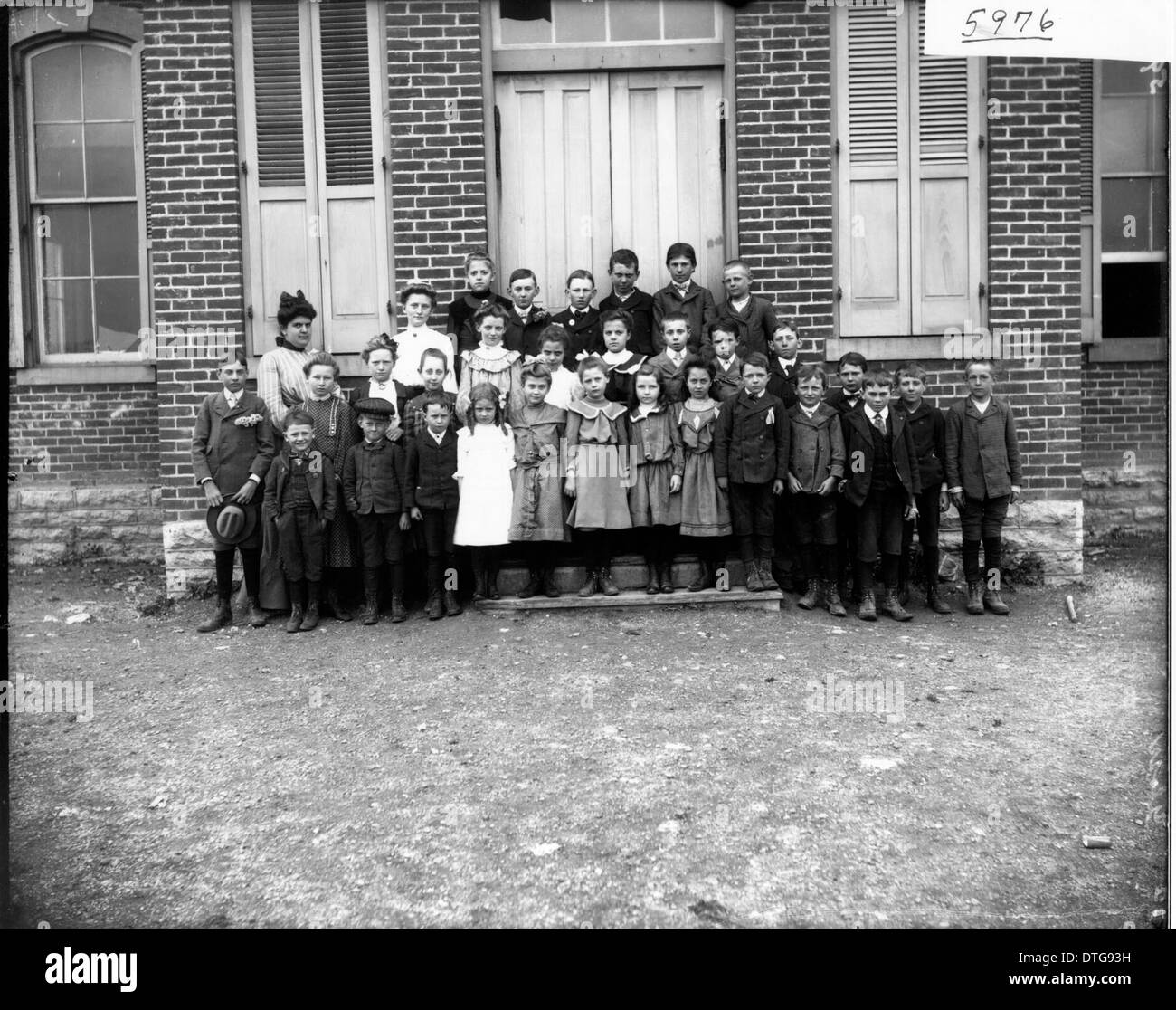 This historical photograph from 1904 shows Miss Abigail Harris with a ...