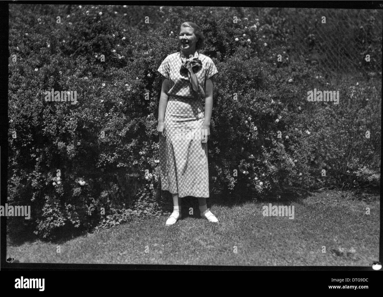 This historical portrait photograph captures a female student from ...