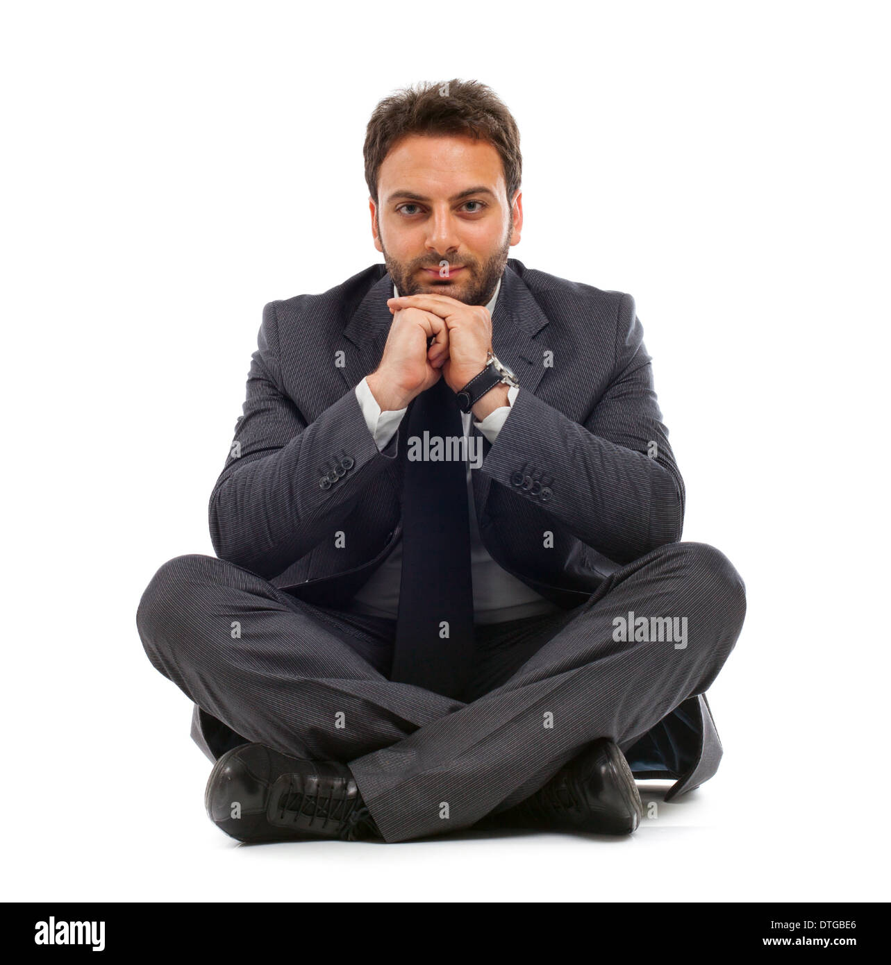 People sitting on the ground Cut Out Stock Images & Pictures - Alamy