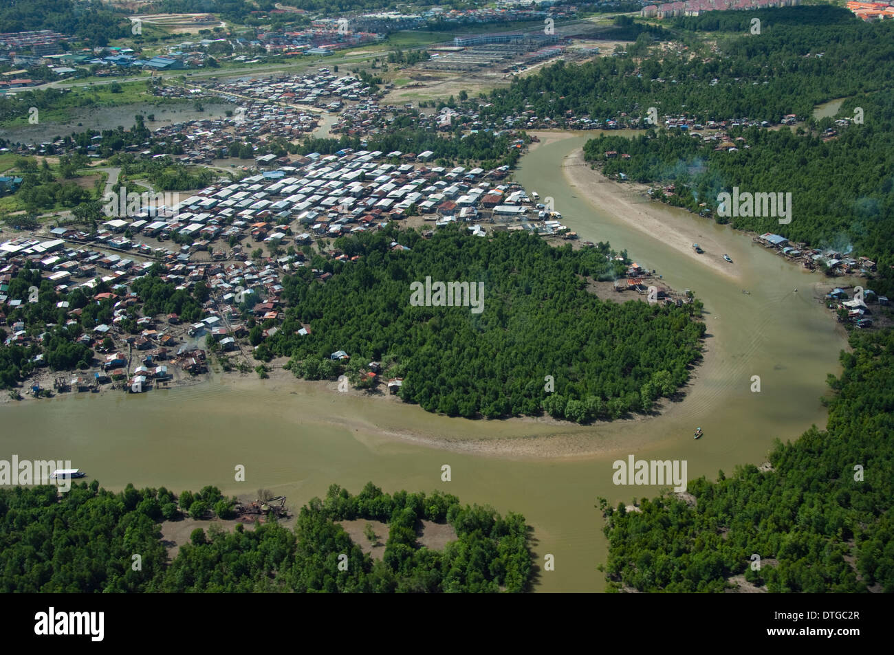 Aerial of houses along the Kinabatangan River, Sandakan, Sabah ...