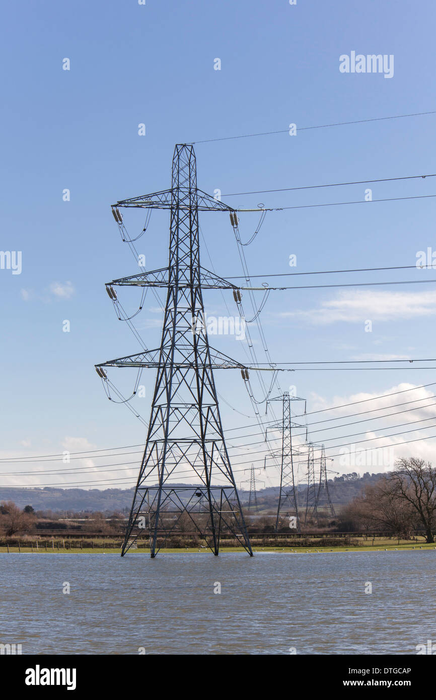 Telegraph pylons in flooded fields near Gloucester, Gloucestershire ...