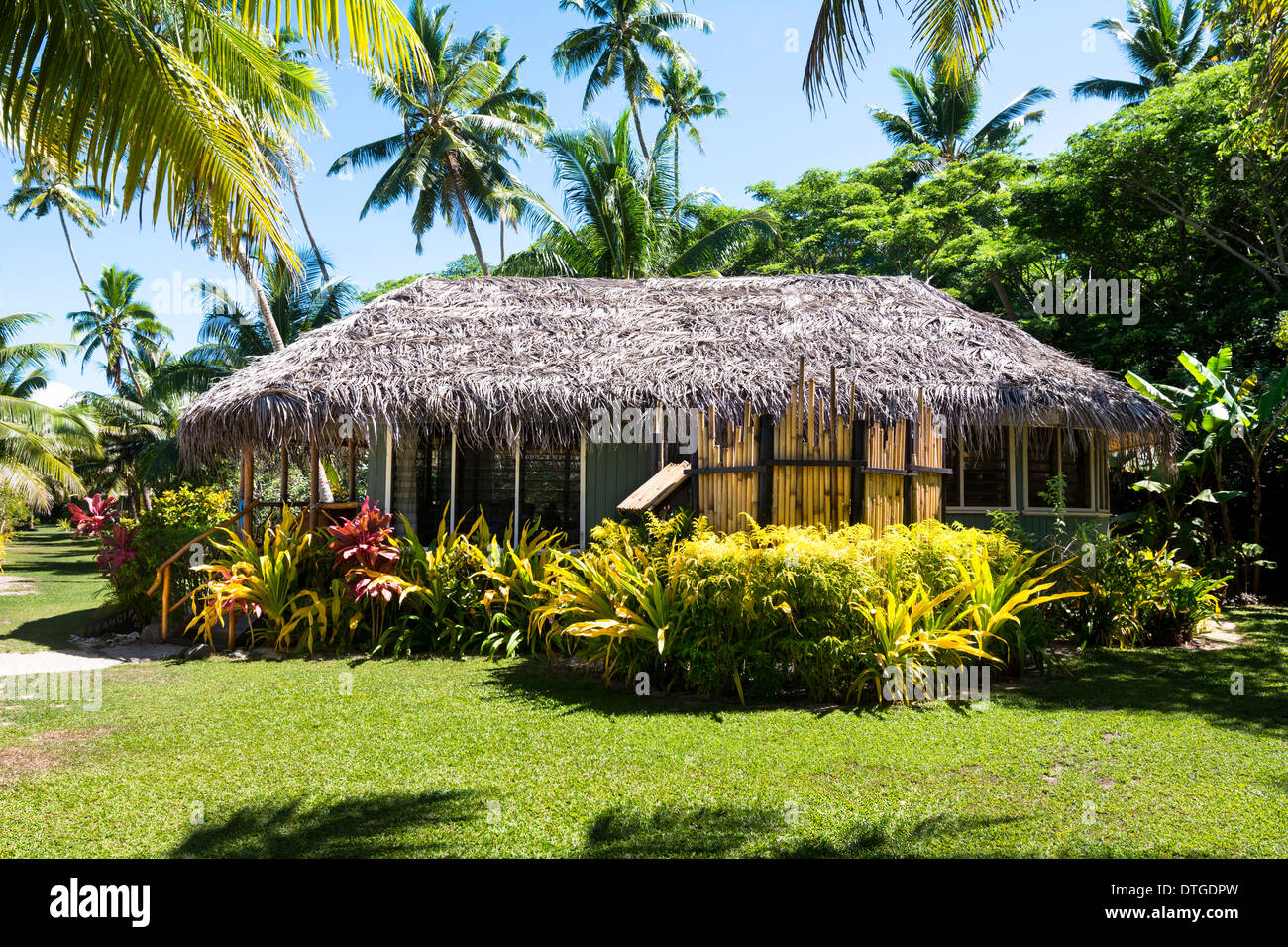 A traditional bure, or lodge, at a south pacific island resort ...