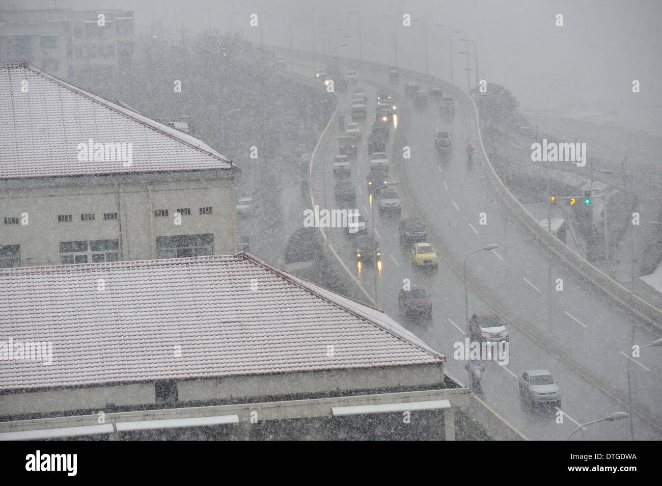 Changsha, China's Hunan Province. 18th Feb, 2014. Vehicles run in snow ...
