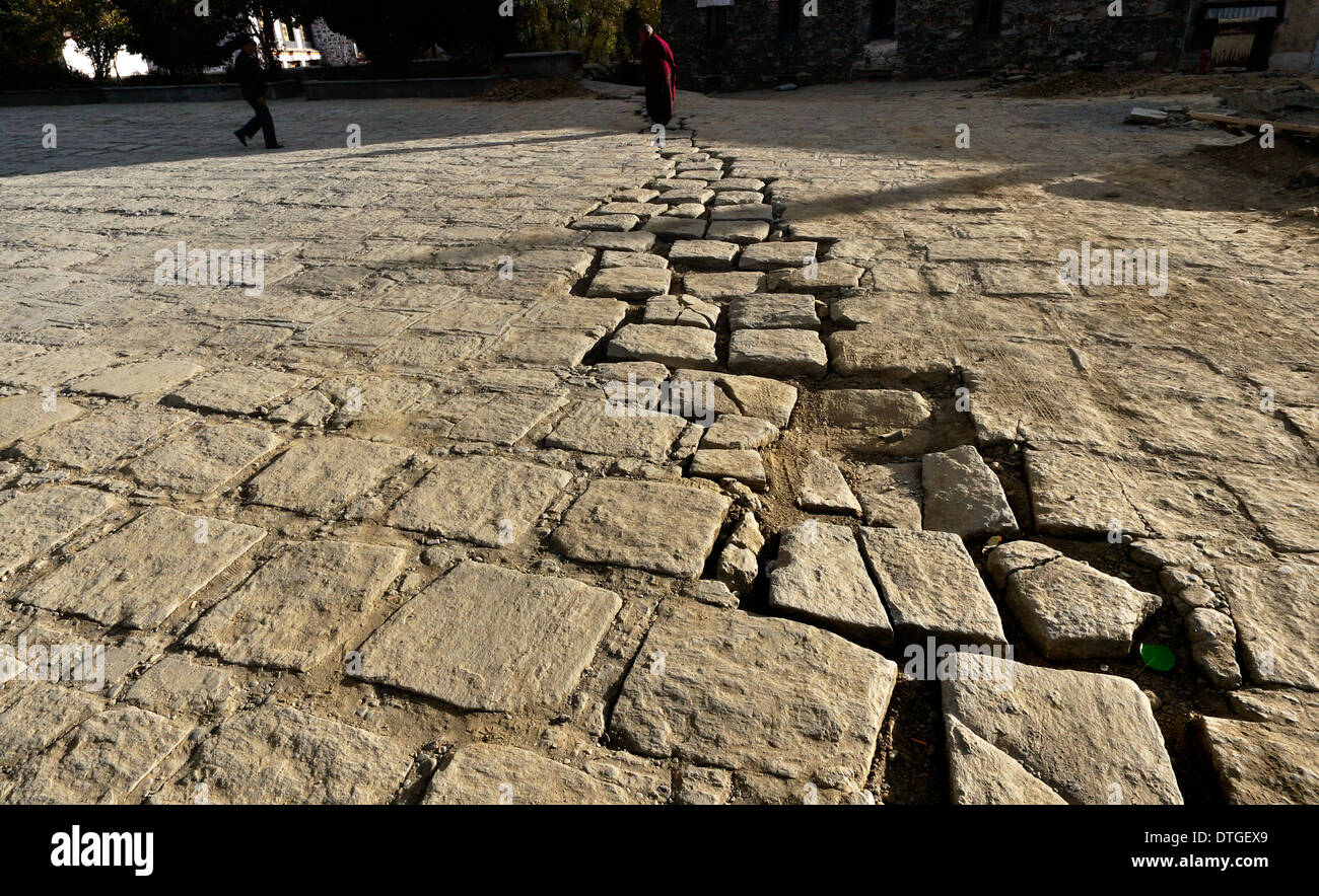 Difficult way of struggle in Tibet Stock Photo - Alamy