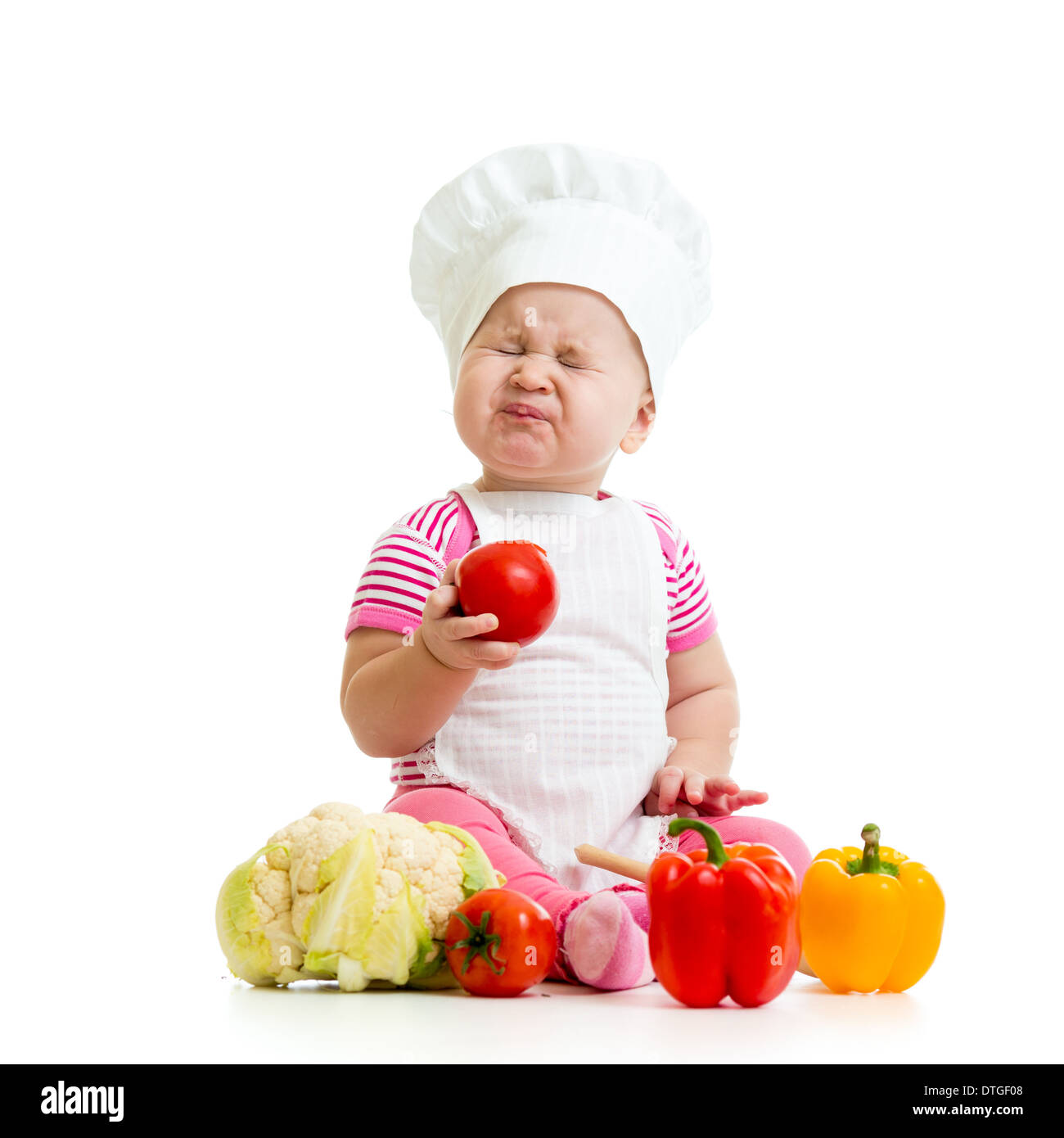 funny baby girl weared cook with vegetables Stock Photo - Alamy