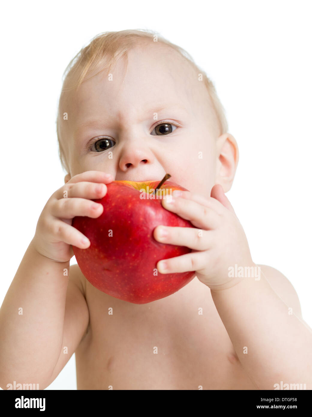 Baby boy eating apple, isolated on white Stock Photo - Alamy