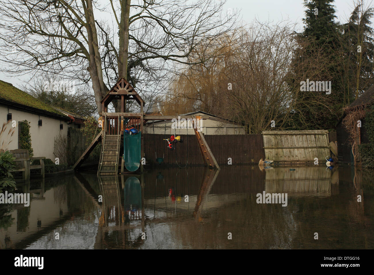 Ham Island, Thames Valley, UK. Flood waters surround a children's ...