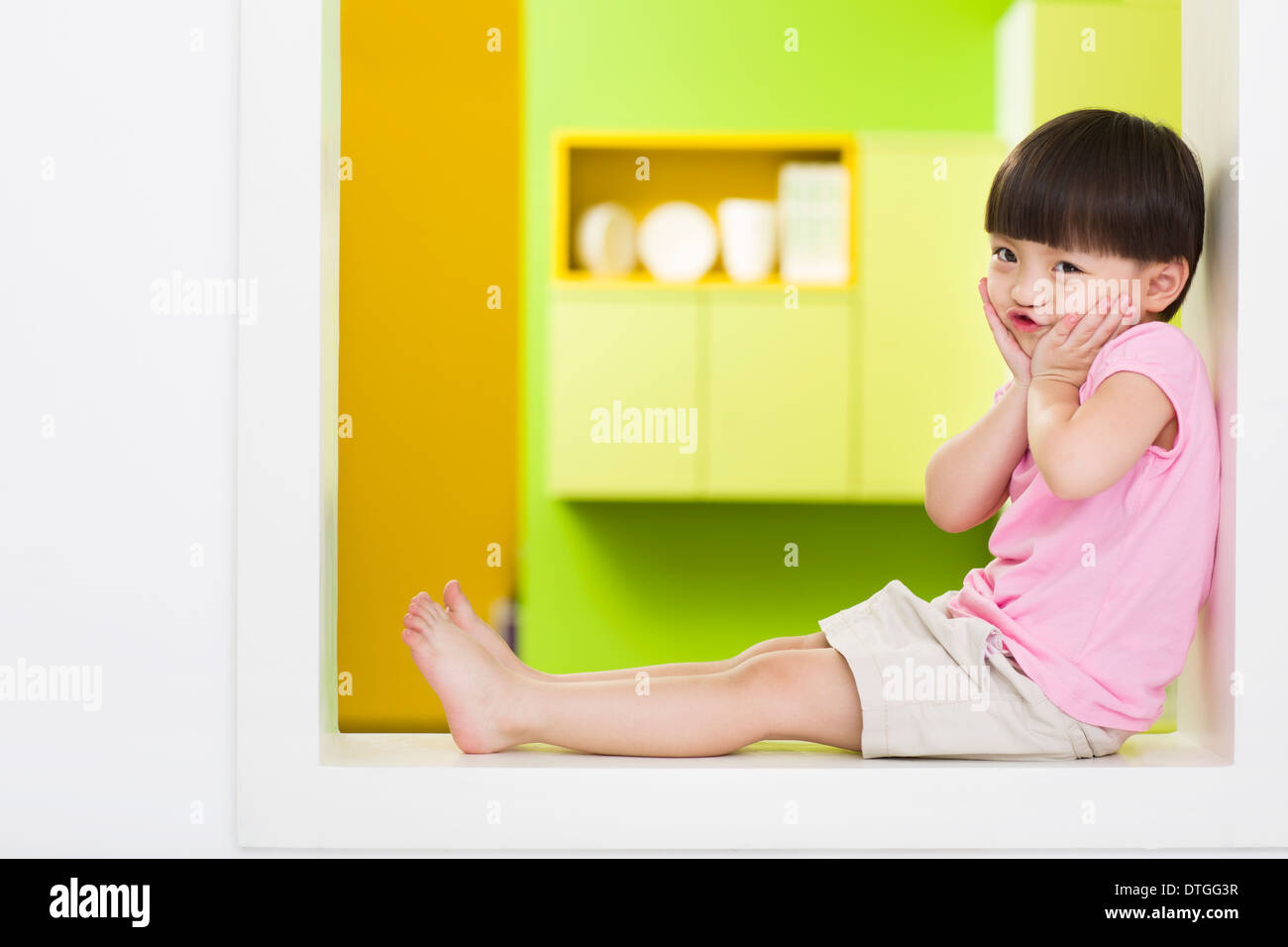 Cute girl puckering Stock Photo - Alamy