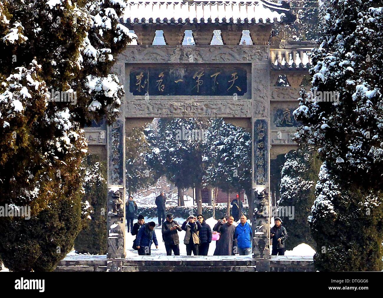 Henan. 18th Feb, 2014. Tourists enjoy snow scenery in Shaolin Temple at ...