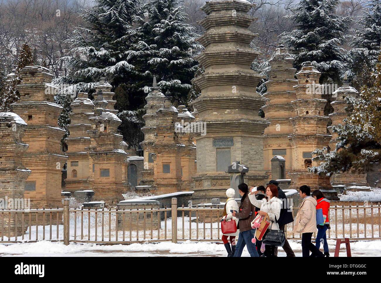 Henan. 18th Feb, 2014. Tourists enjoy snow scenery in Shaolin Temple at ...