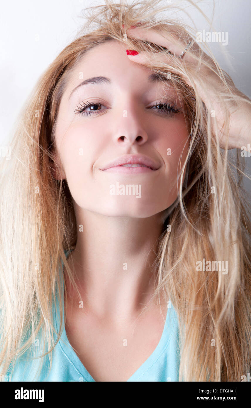 teenage girl with hand on hair Stock Photo - Alamy