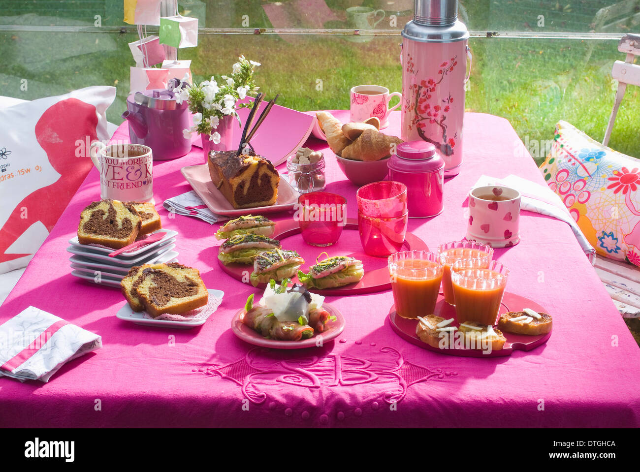Summer brunch on a table outdoors Stock Photo - Alamy