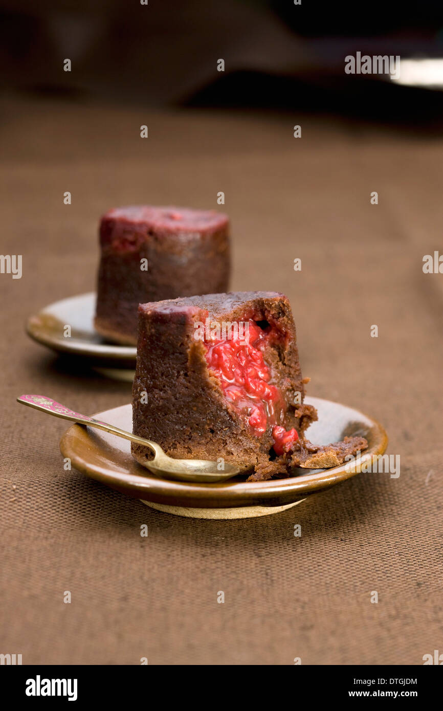 Chocolate and raspberry fondant Stock Photo - Alamy