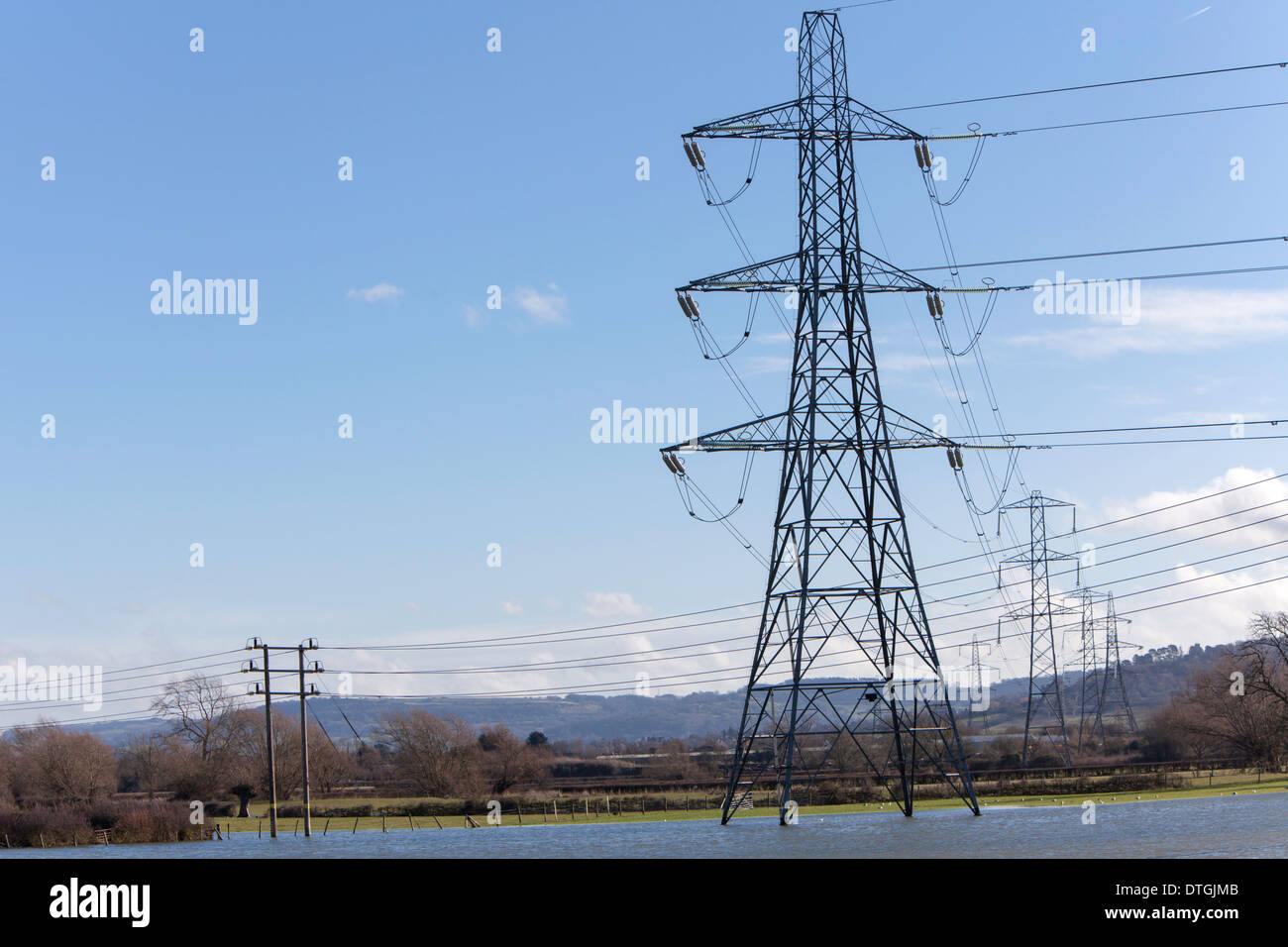 Telegraph pylons in flooded fields near Gloucester, Gloucestershire ...