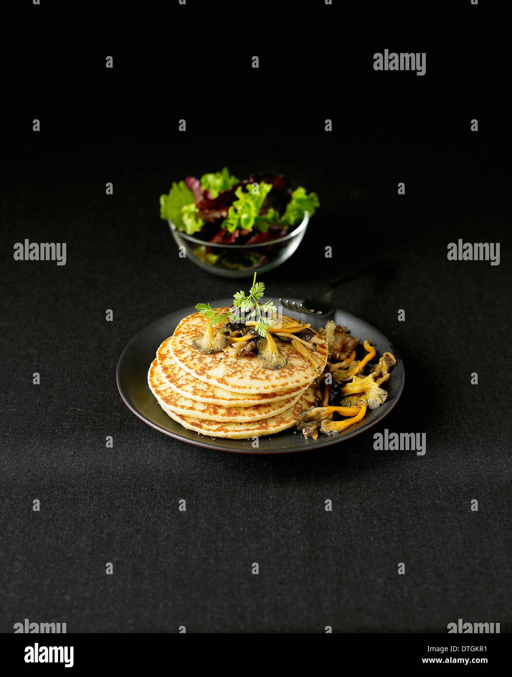 Potato blinis with mushrooms Stock Photo - Alamy