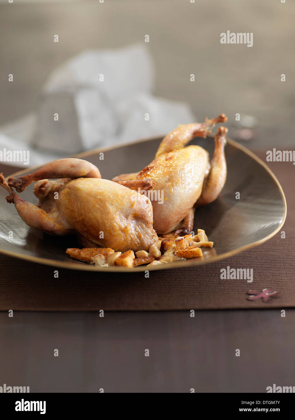 Roast quail with foie gras Stock Photo - Alamy