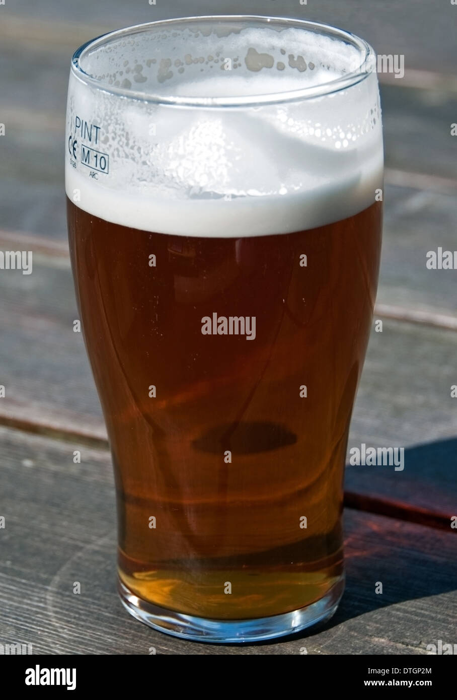 Pint glass of beer Stock Photo - Alamy