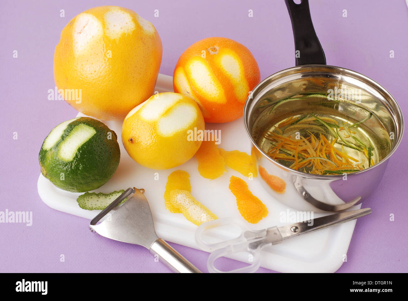 Making citrus fruit zests and rinds Stock Photo - Alamy