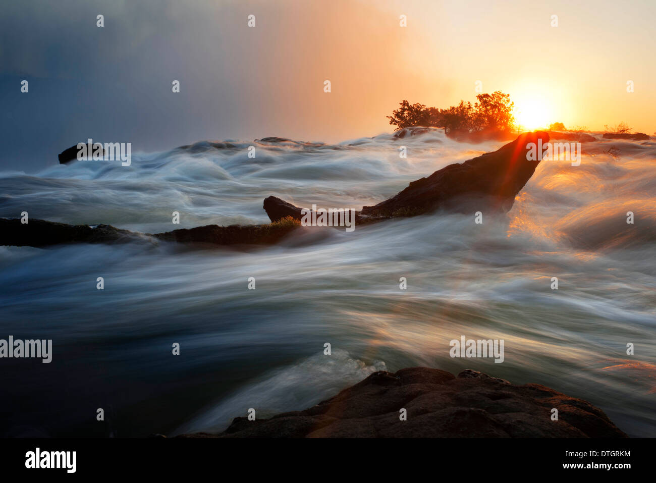 Sunset in the Victoria Falls. The Victoria Falls or Mosi-oa-Tunya ...