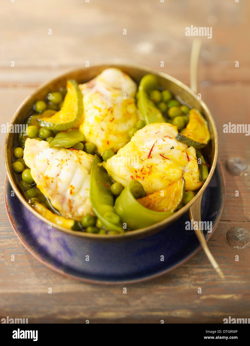 Monkfish,pea and saffron Tajine Stock Photo - Alamy
