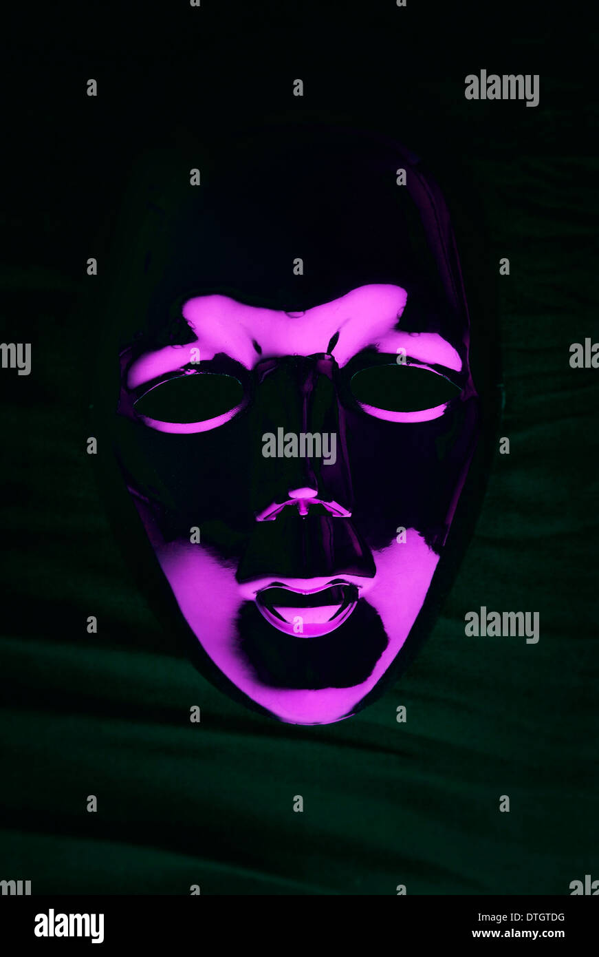 Mask on a black background Stock Photo - Alamy