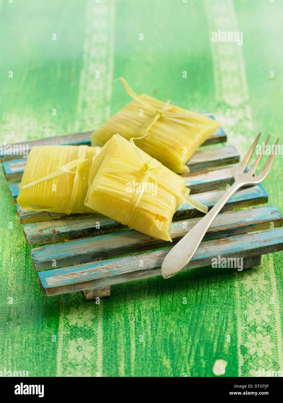 Humitas,Paraguayan corn paste wrapped in corn leaves Stock Photo - Alamy