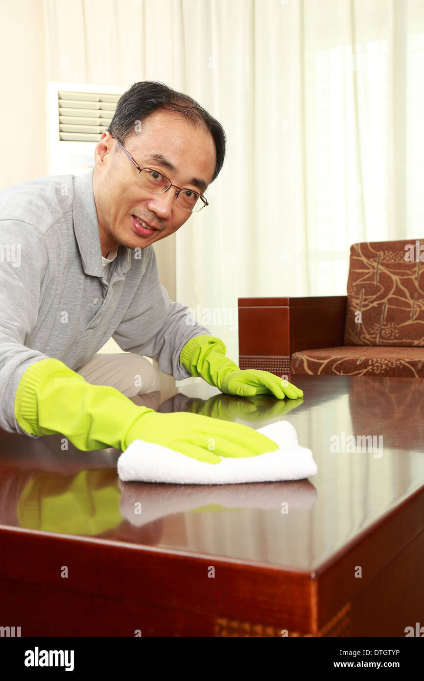 Man doing housework hi-res stock photography and images - Alamy