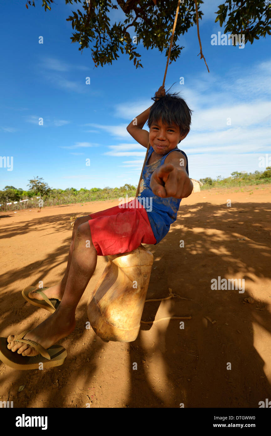 Children playing on a swing hi-res stock photography and images - Alamy