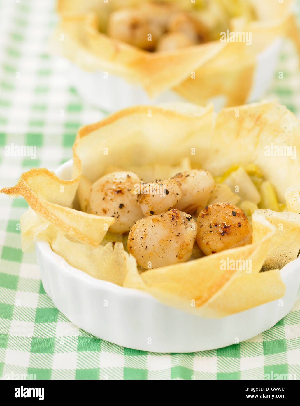 Scallop and leek filo pastry tart Stock Photo - Alamy