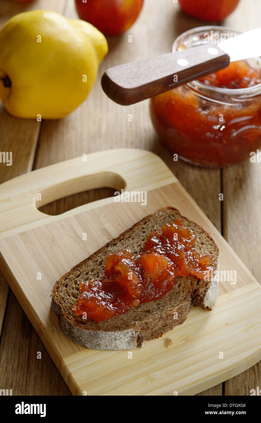 Bread and apple quince jam sandwich on the cut board Stock Photo - Alamy