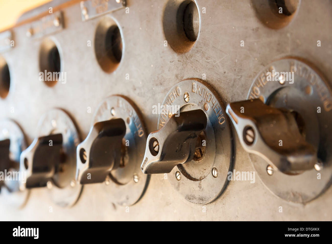 Old retro style turn buttons on a device Stock Photo - Alamy