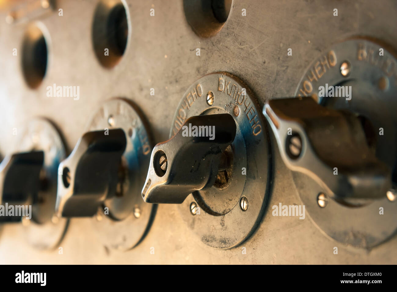 Old retro style turn buttons on a device Stock Photo - Alamy