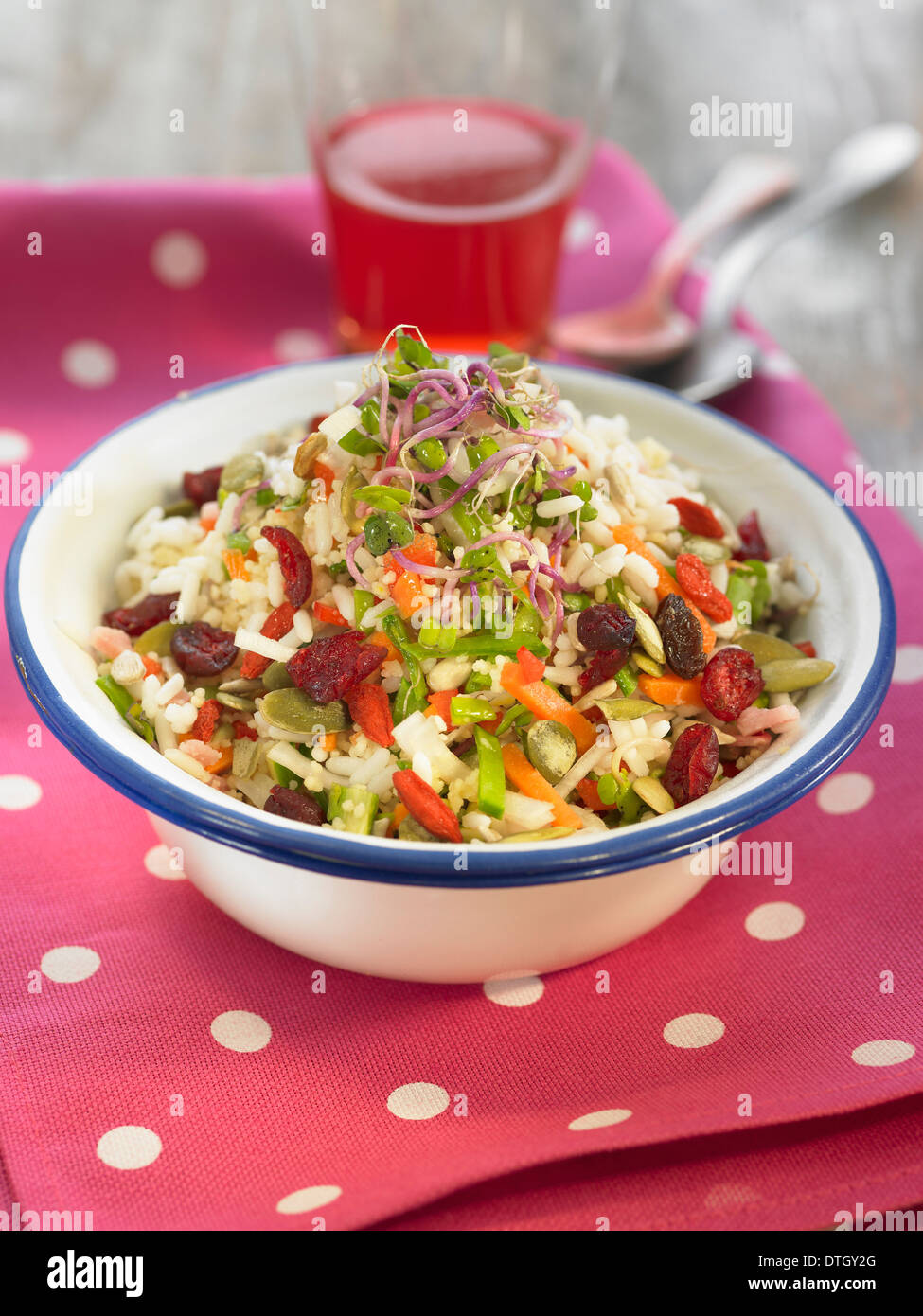 Rice tabbouleh with peas,sugar peas,goji beans and raisins Stock Photo ...