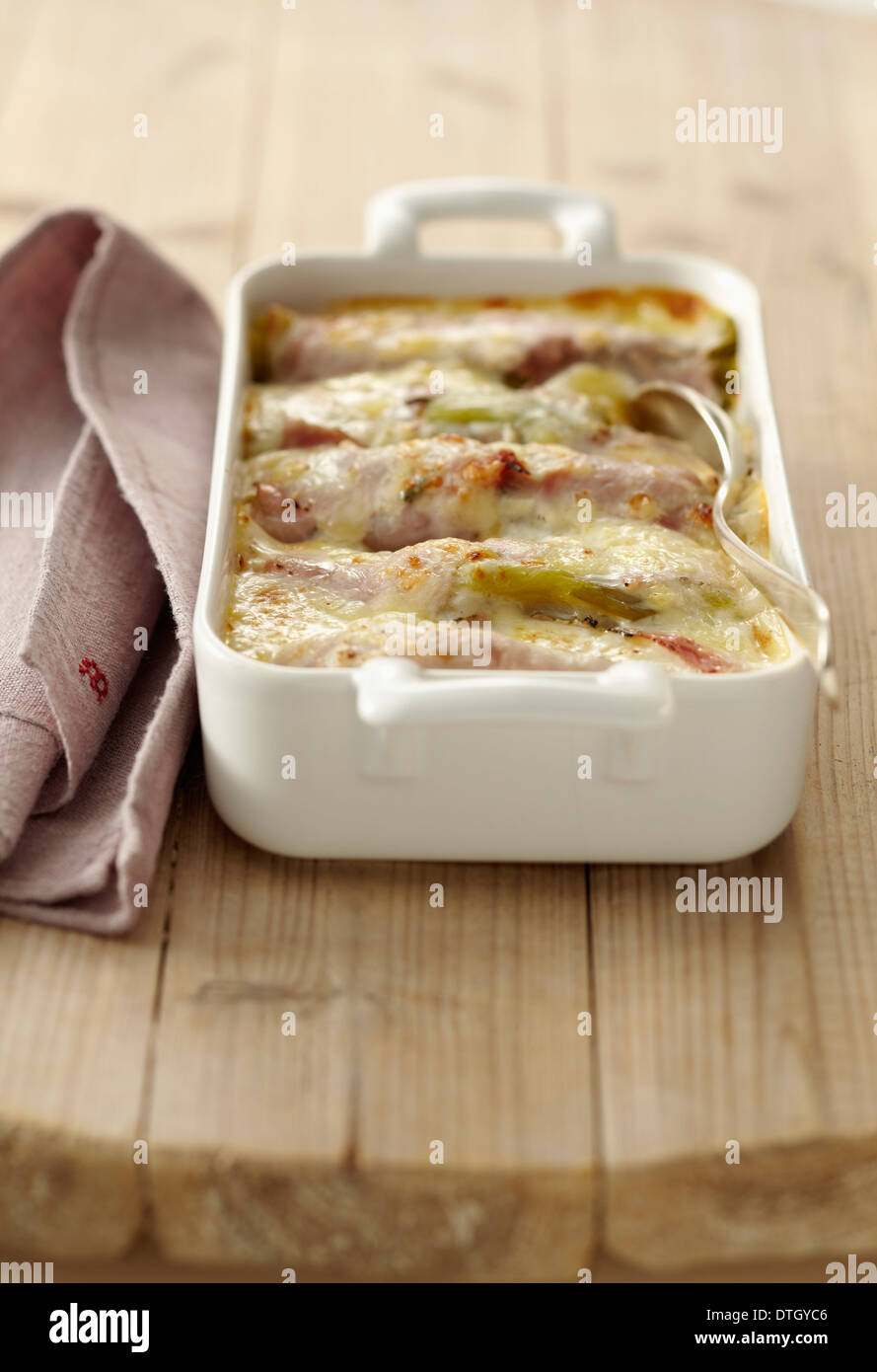 Leek and ham cheese-topped dish Stock Photo - Alamy