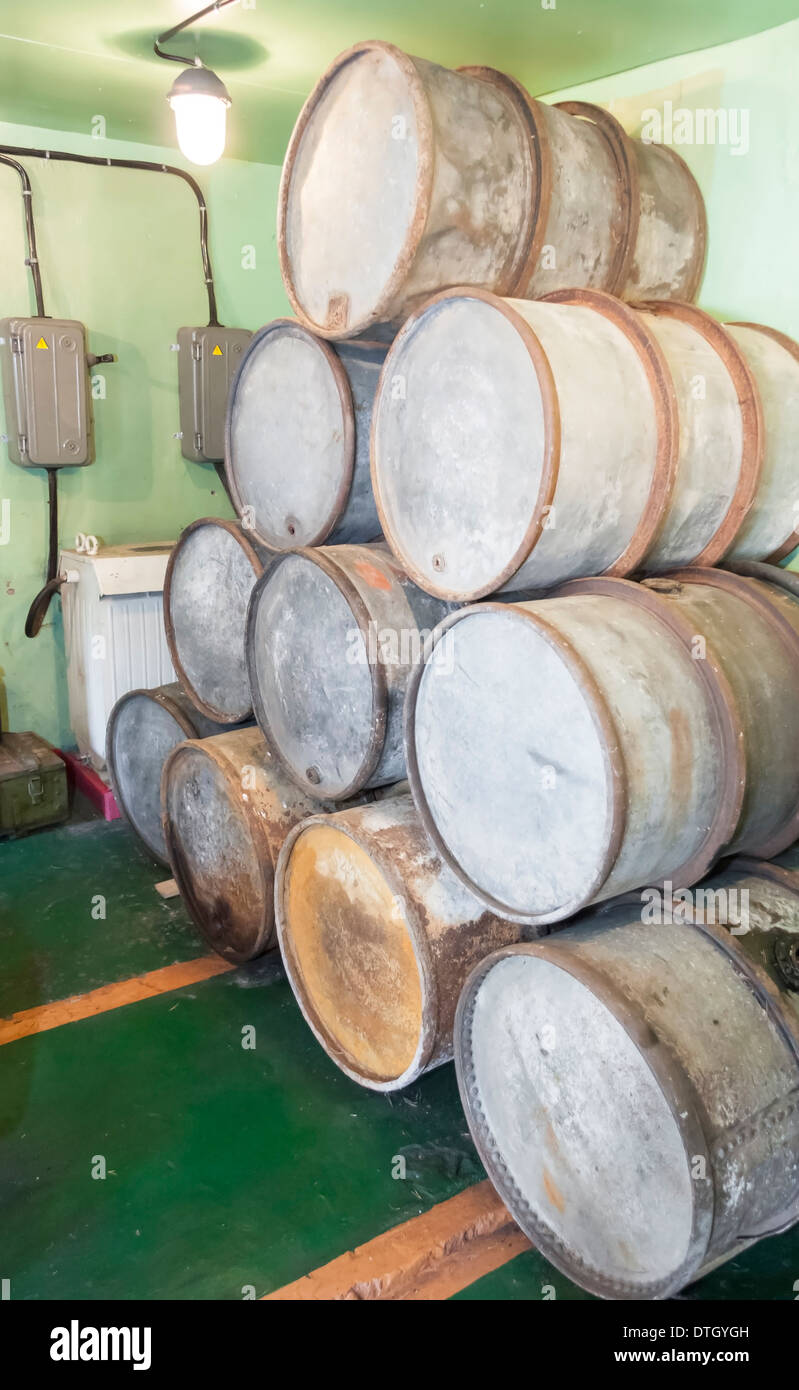 Ten old mazut barrels in pyramid shape Stock Photo - Alamy