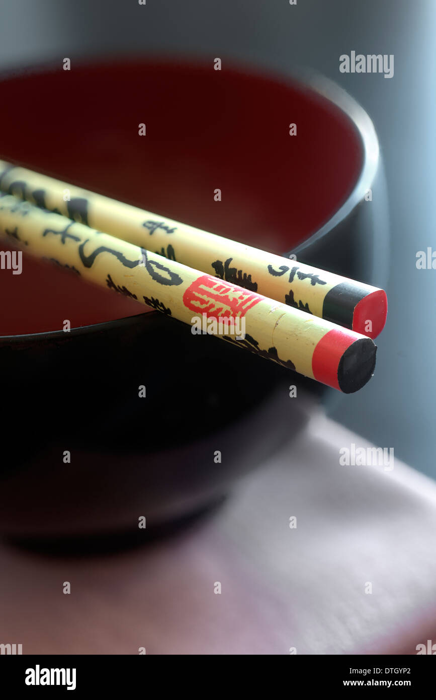 Japanese rice bowl with chop sticks and kanji Stock Photo - Alamy