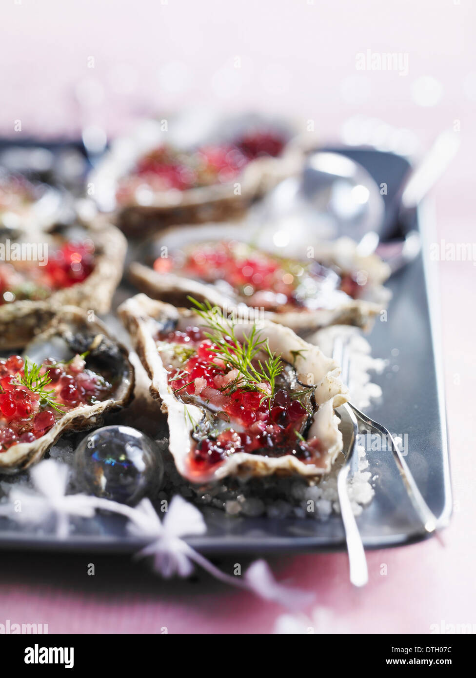 Fresh oysters with raspberry vinaigar Stock Photo - Alamy