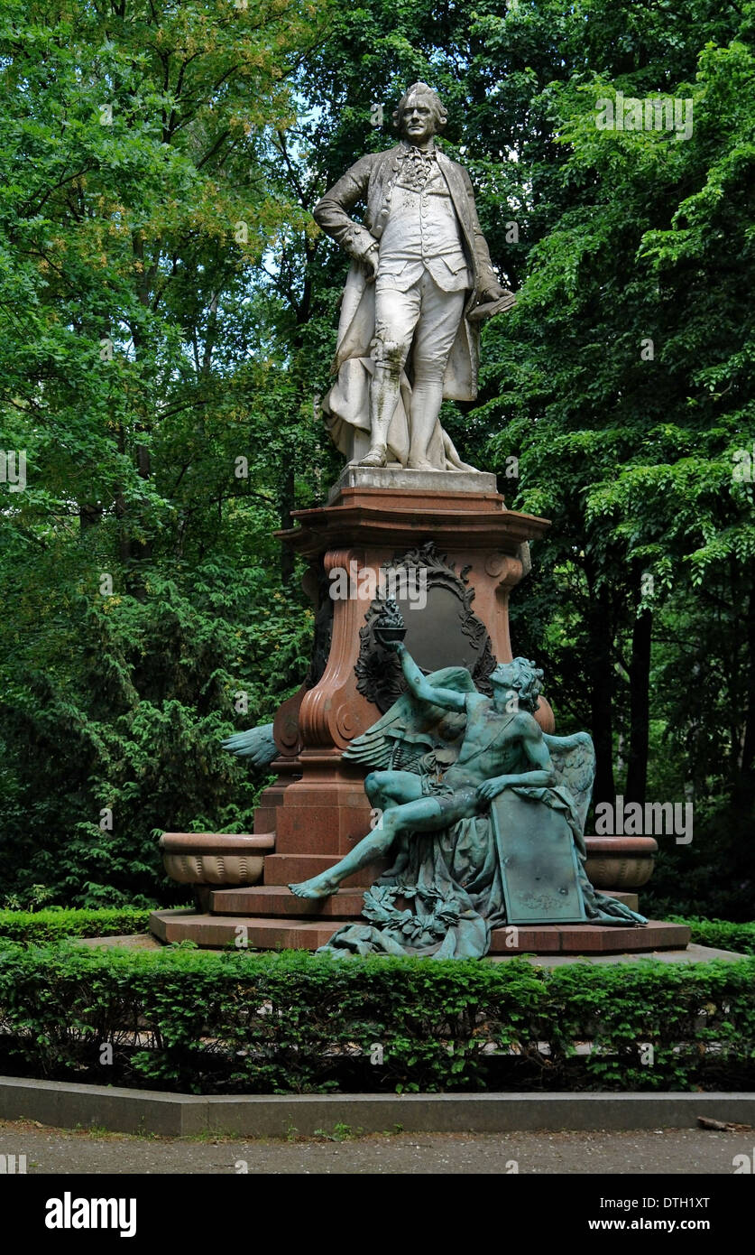 statue of Lessing in Berlin (Germany) sirrounded by green vegetation at ...