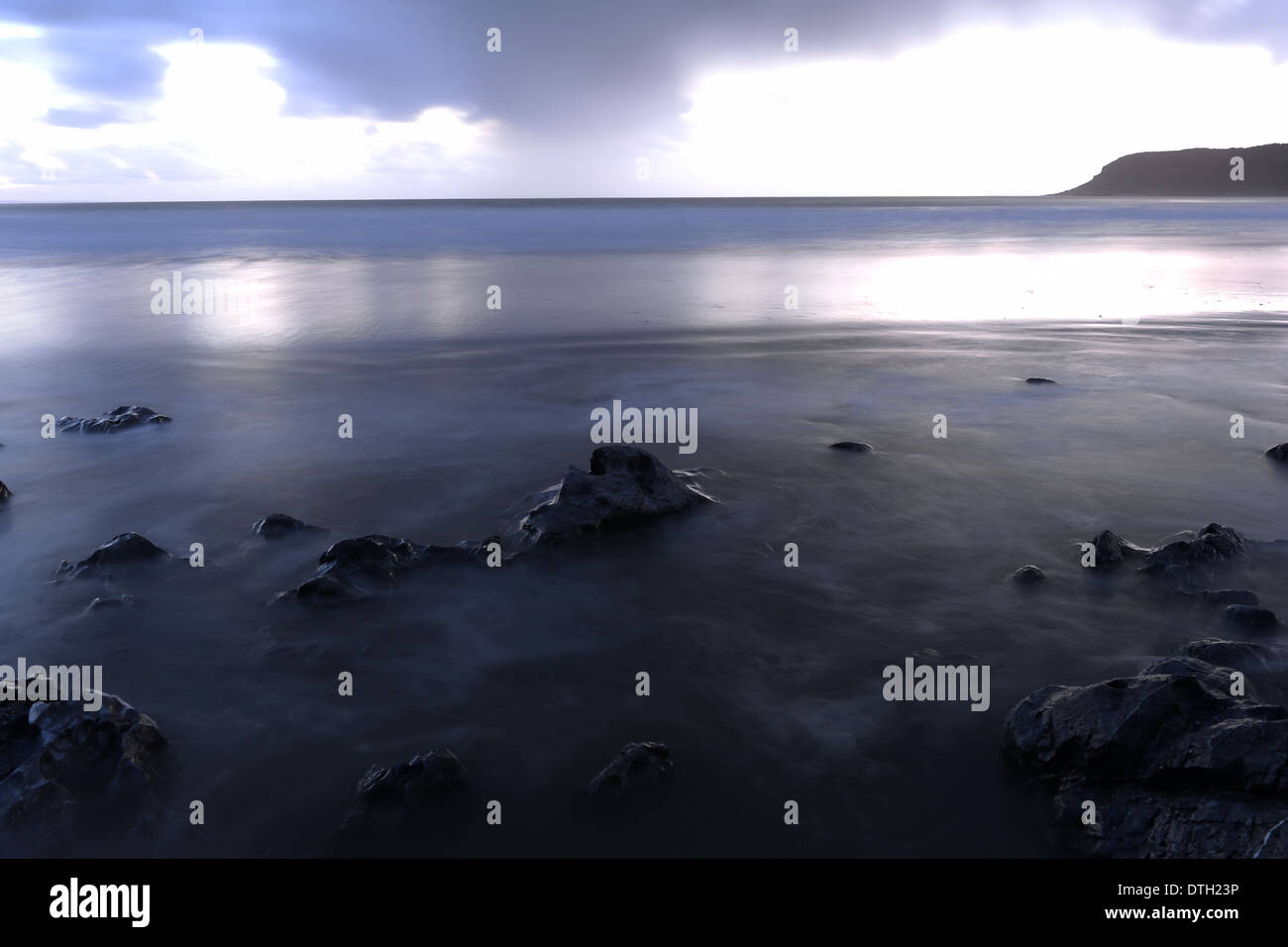 the incoming tide leaves a trace of its movement in a rock pool Stock ...