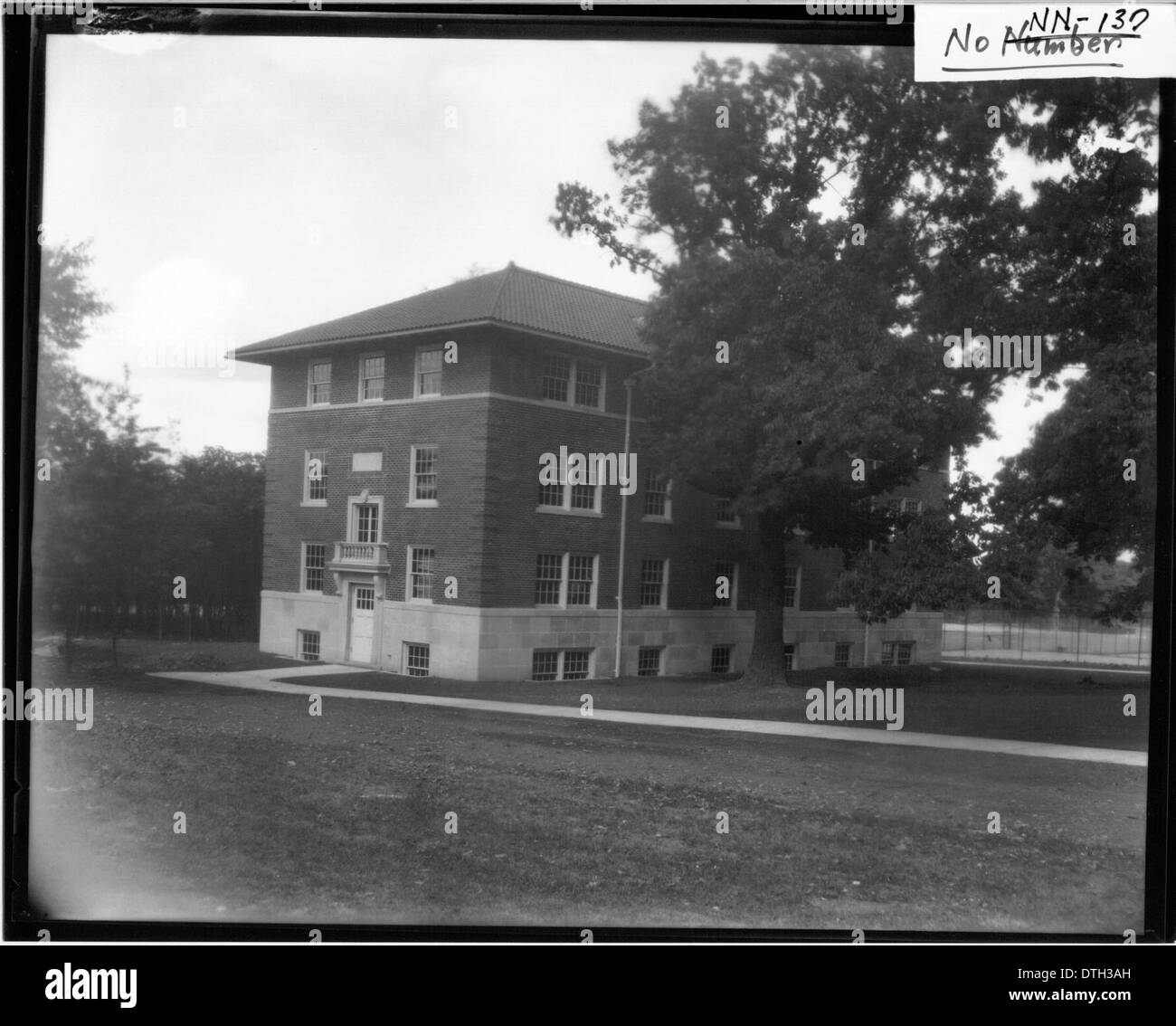 A historic photograph of Swing Hall, captured from the west side around ...