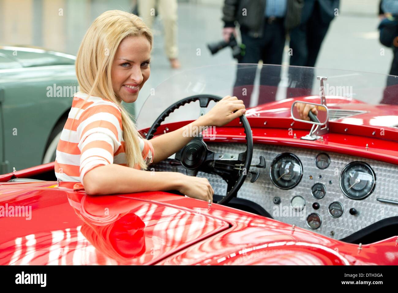Model Sarah poses in a Talbot Maserati America at a press conference ...