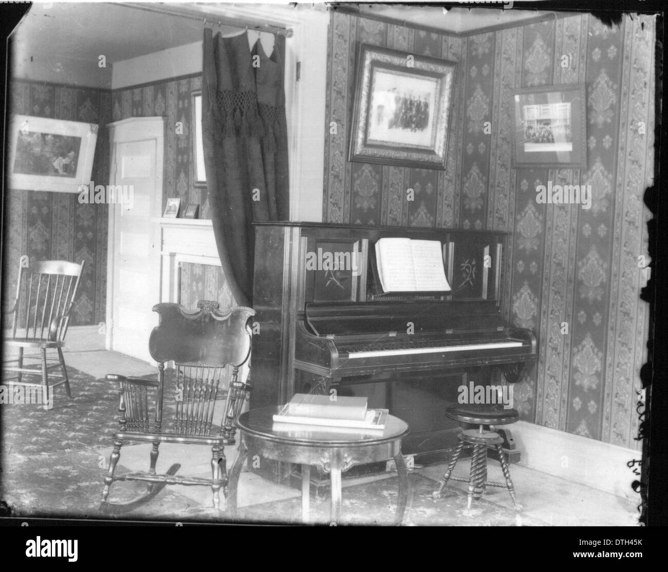 A historical photograph showcasing the parlor of the Sigma Chi ...