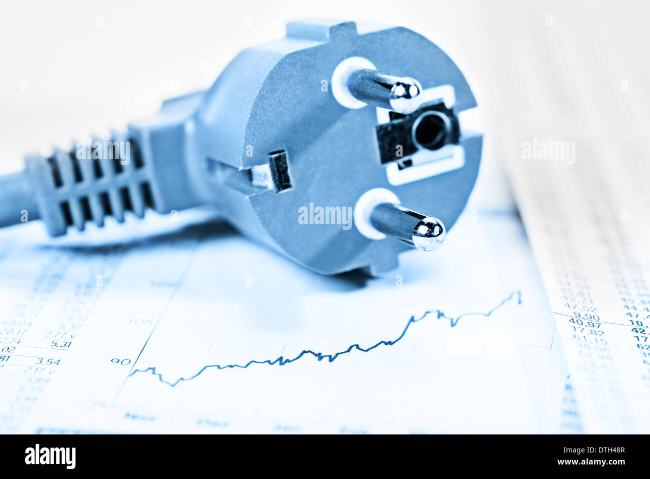 Plug and graphics with rising curve as a symbol for high electricity ...