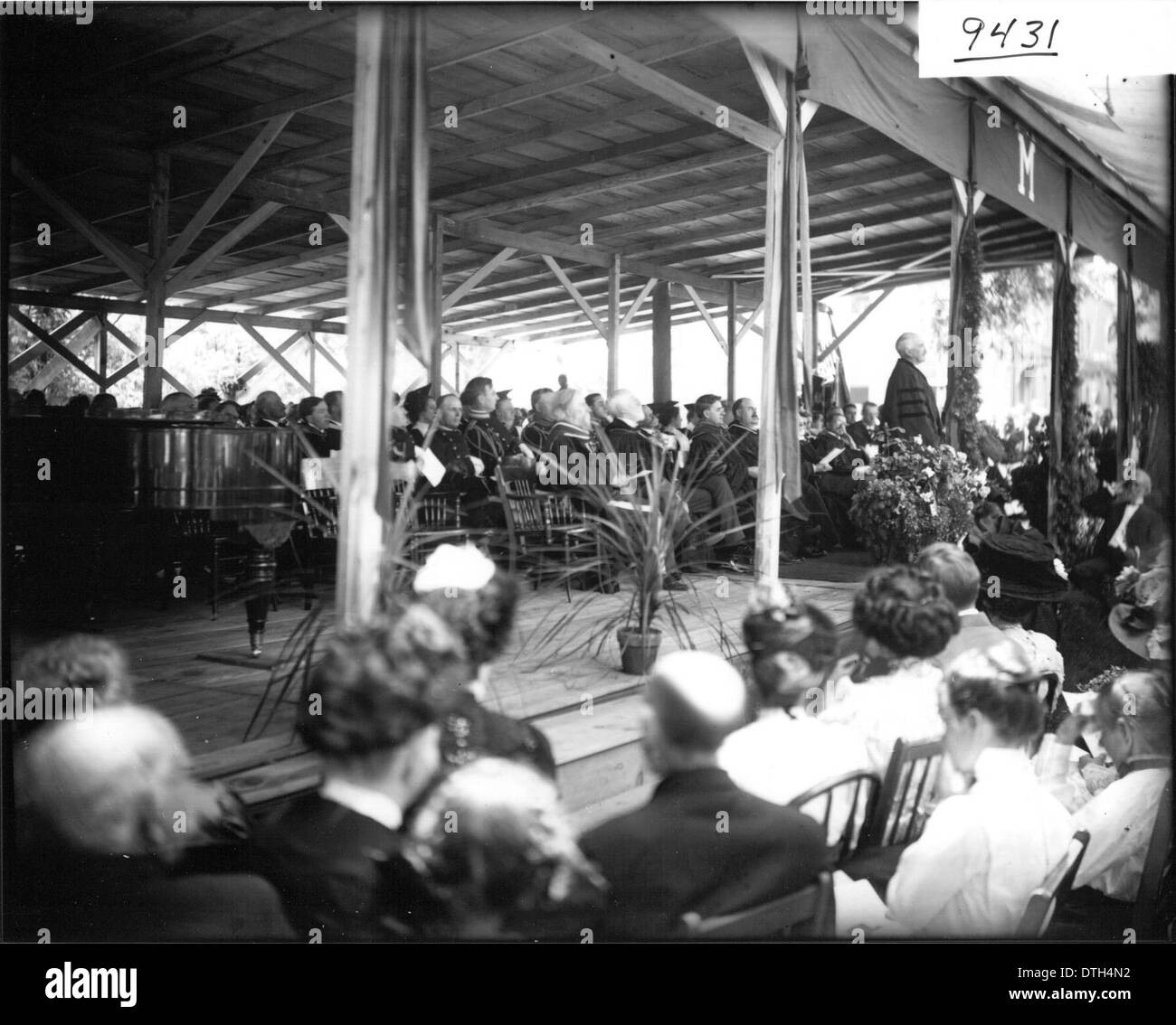 This historical photograph captures a platform group at the Miami ...