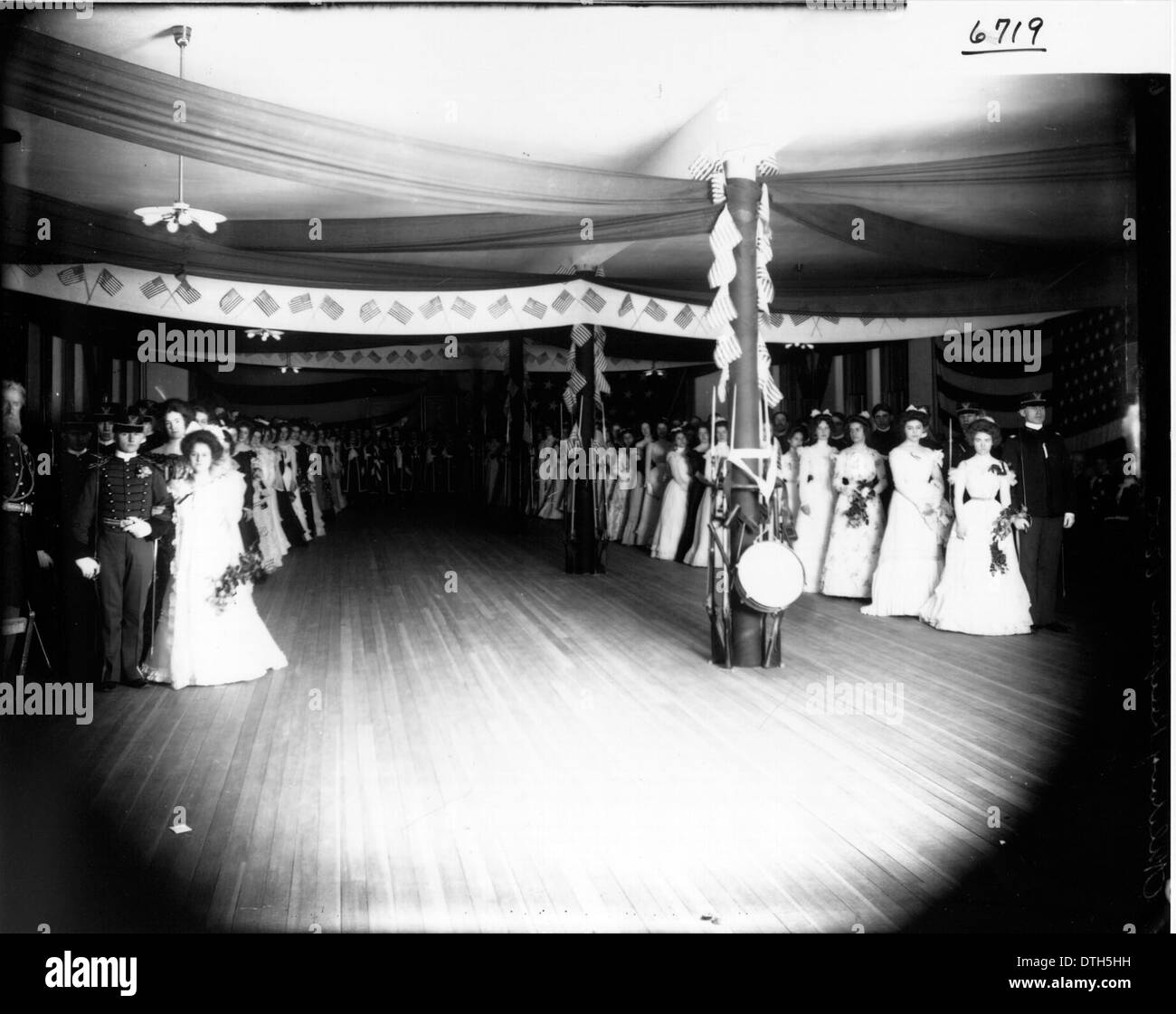 This photograph from around 1900 shows uniformed men with escorts at a ...