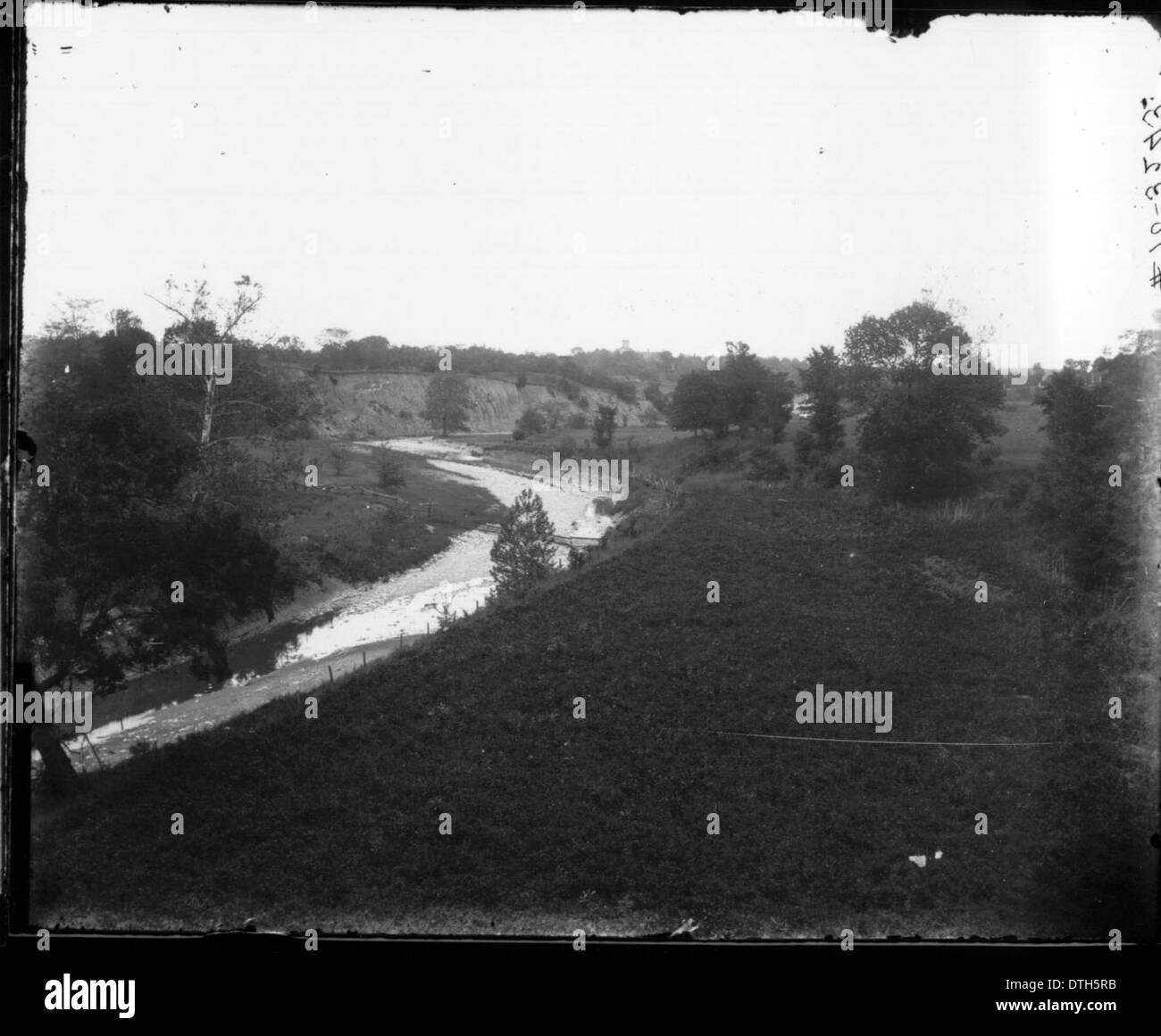 An overhead view of a creek, captured in a historical photograph from ...
