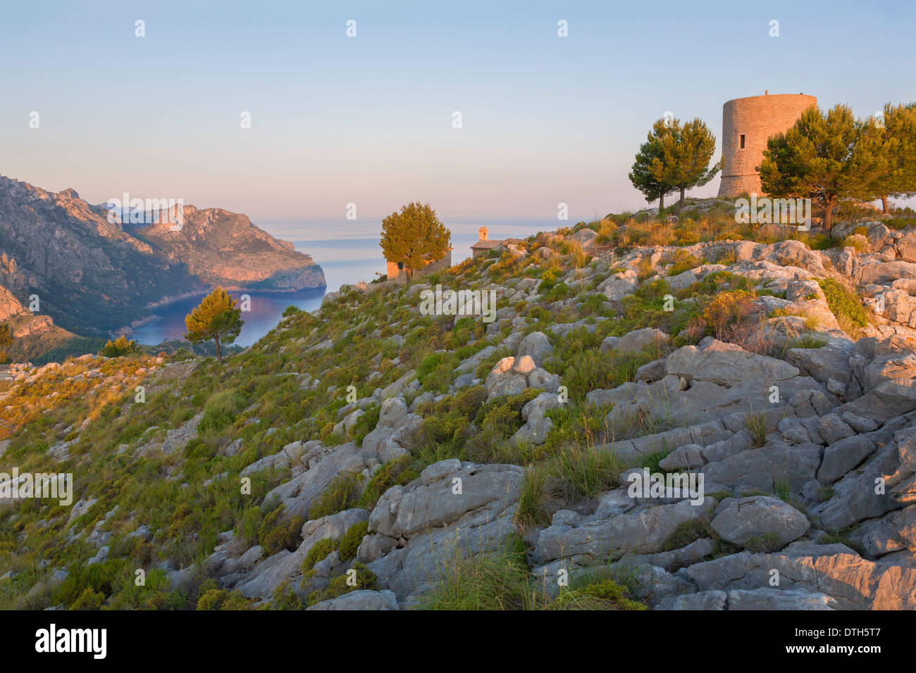 16th century Torre de Can Palou pirate watchtower at sunrise. Escorca ...