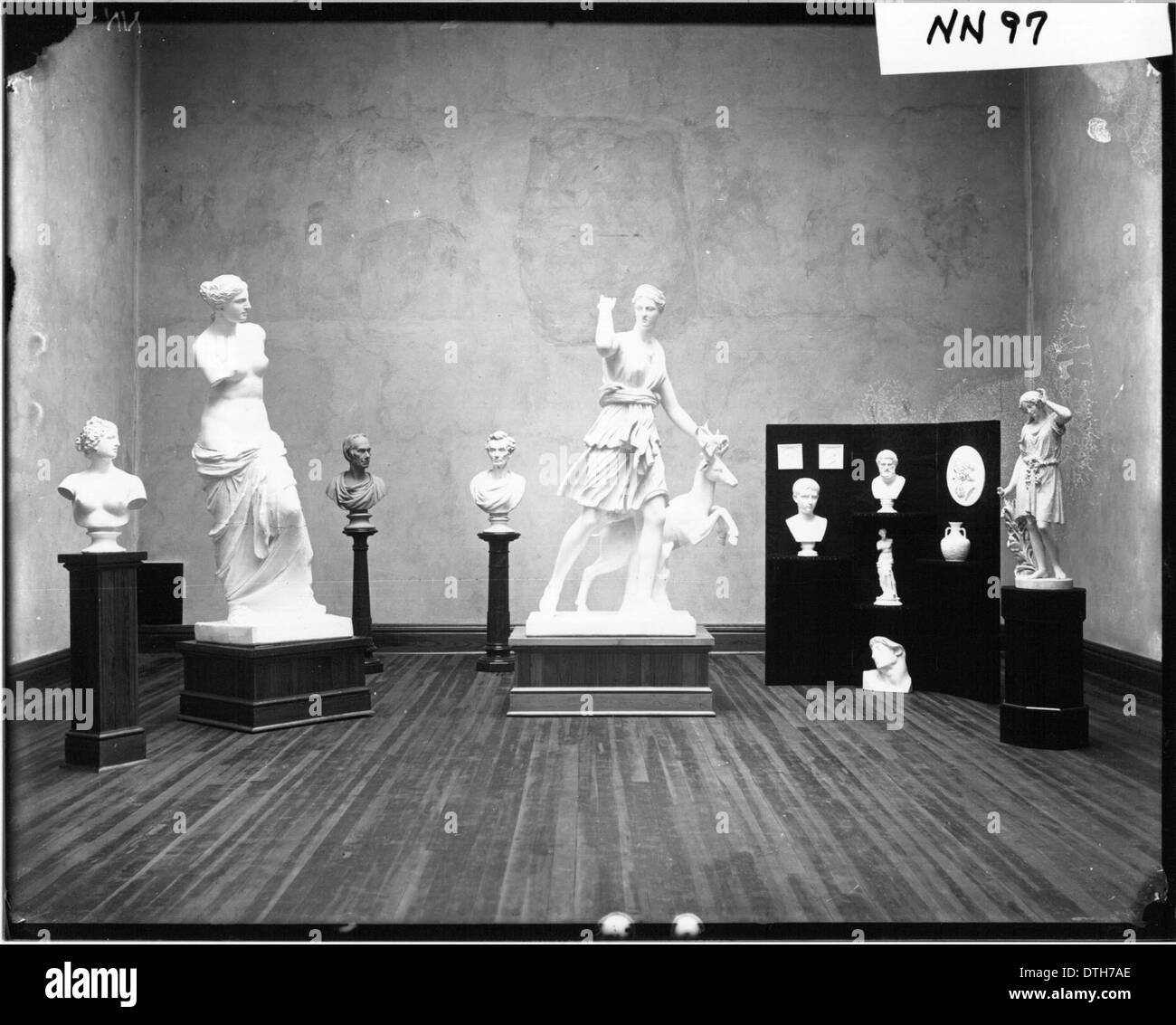 This image captures a collection of sculptures arranged in a staged ...