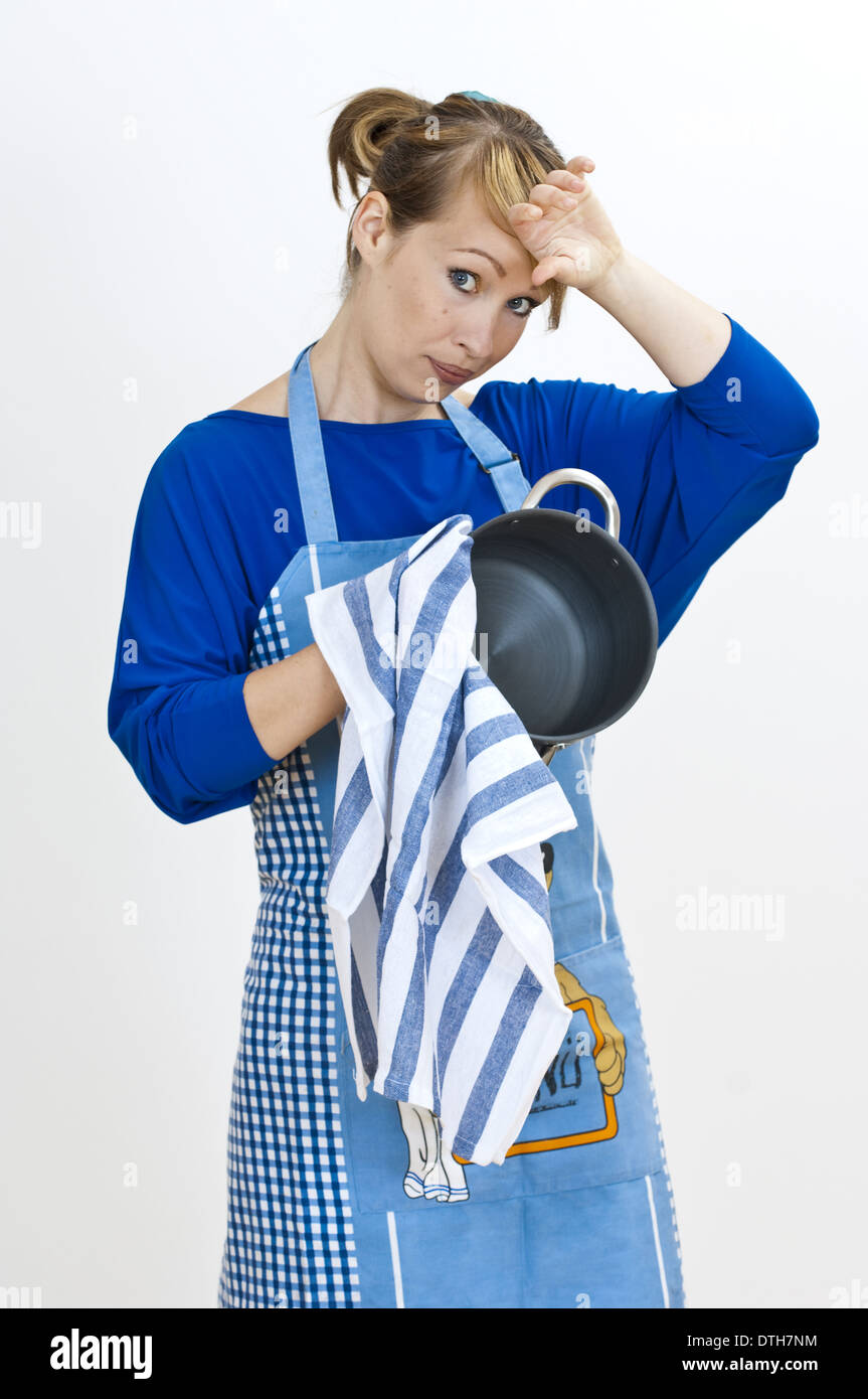 Housewife Apron Cleaning Dishes Stock Photos & Housewife Apron Cleaning ...